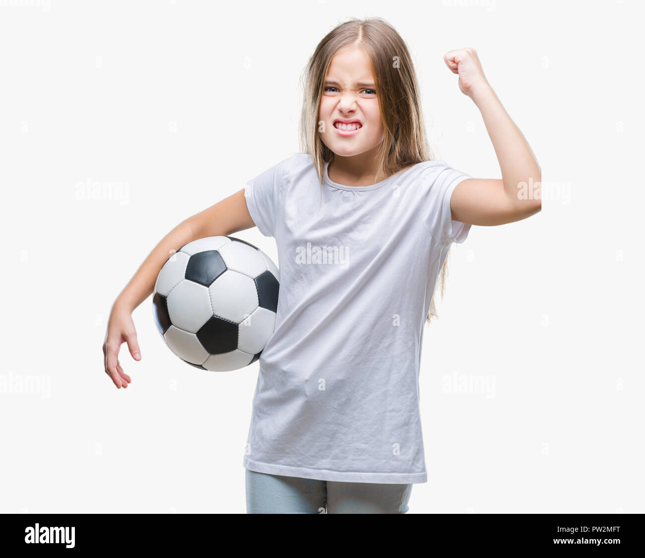 Young beautiful girl holding soccer football ball over isolated background annoyed and frustrated shouting with anger crazy and yelling with raised h Stock Photo Alamy