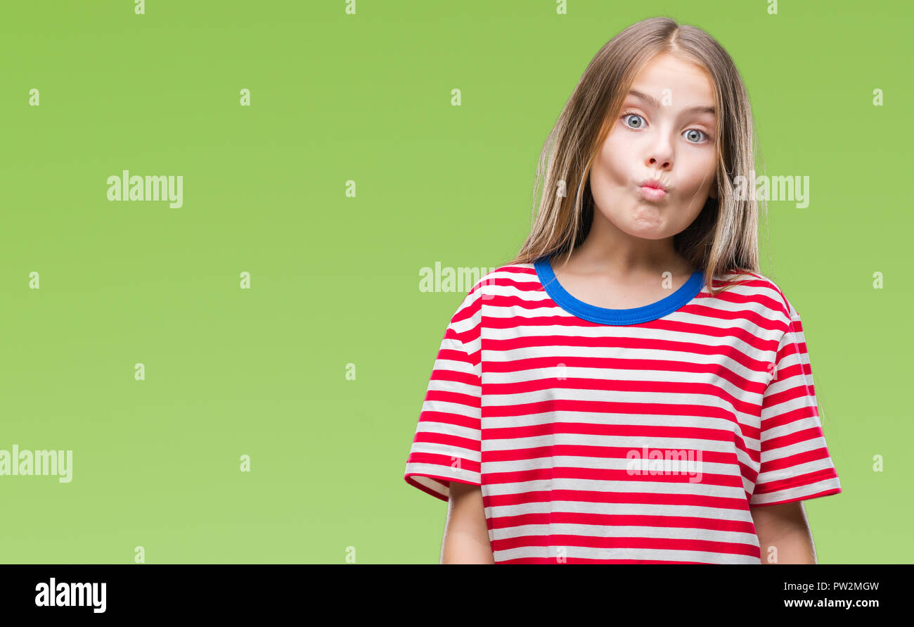Young beautiful girl over isolated background making fish face with ...