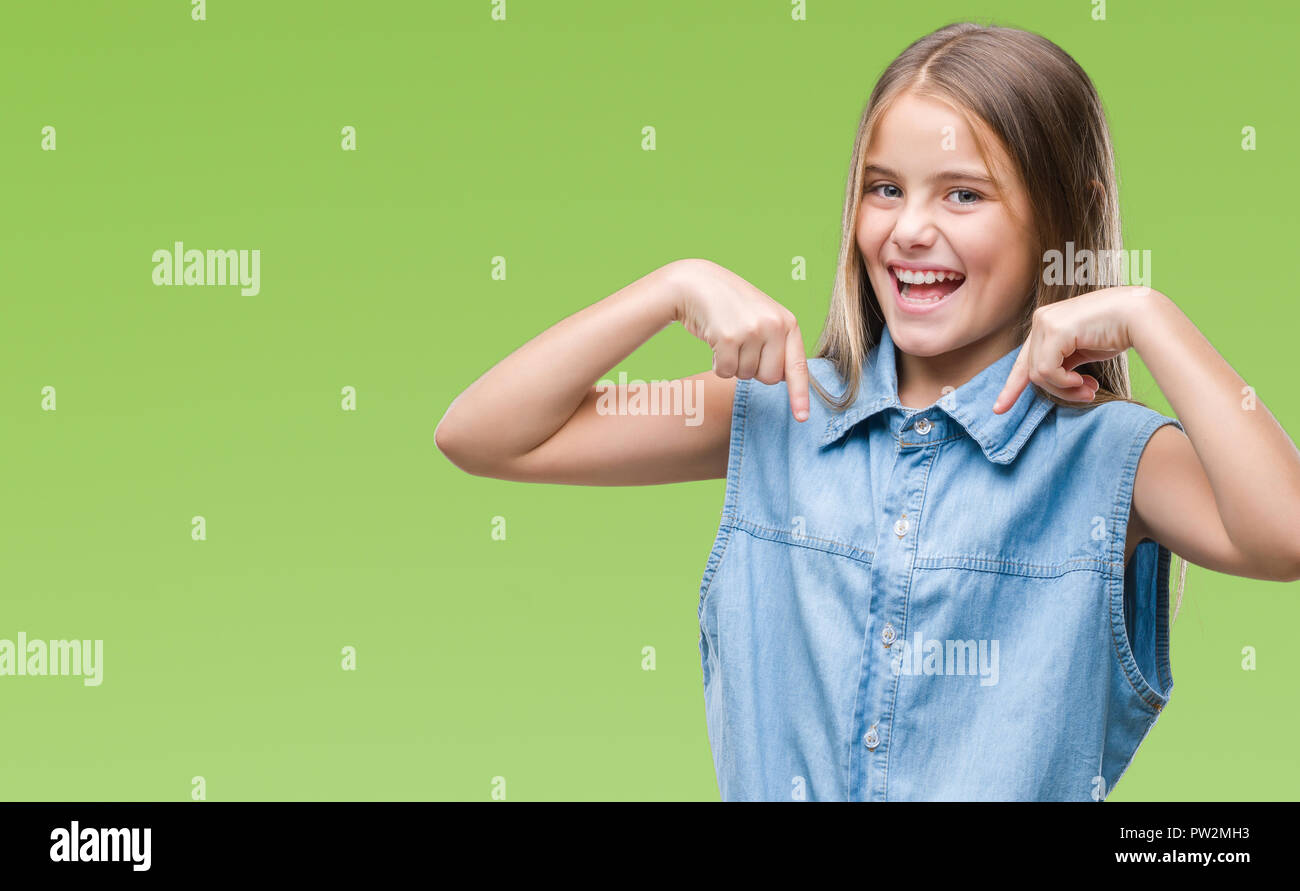 Young beautiful girl over isolated background looking confident with ...