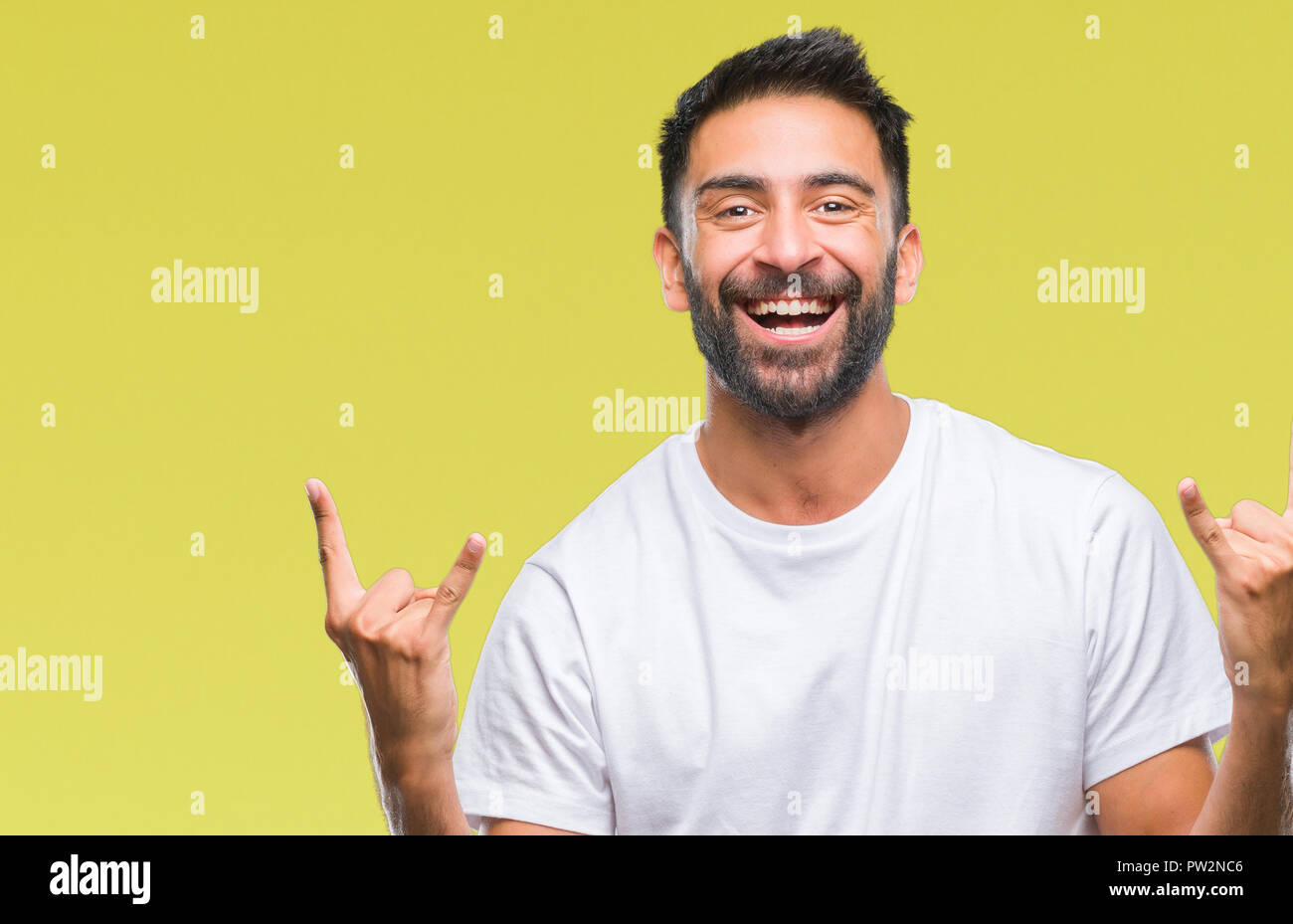 Adult hispanic man over isolated background shouting with crazy ...