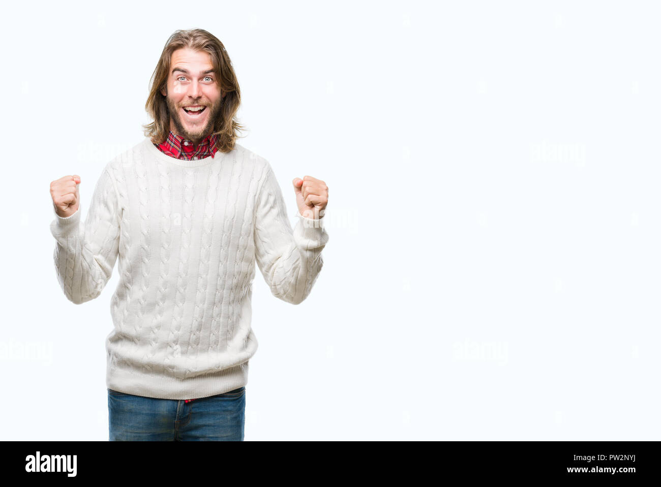 Young handsome man with long hair wearing winter sweater over isolated ...