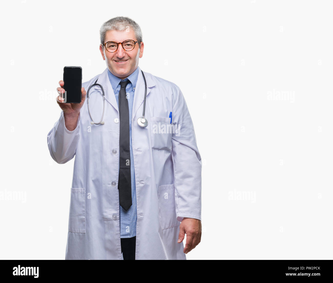 Handsome senior doctor man showing screen of smarpthone over isolated ...