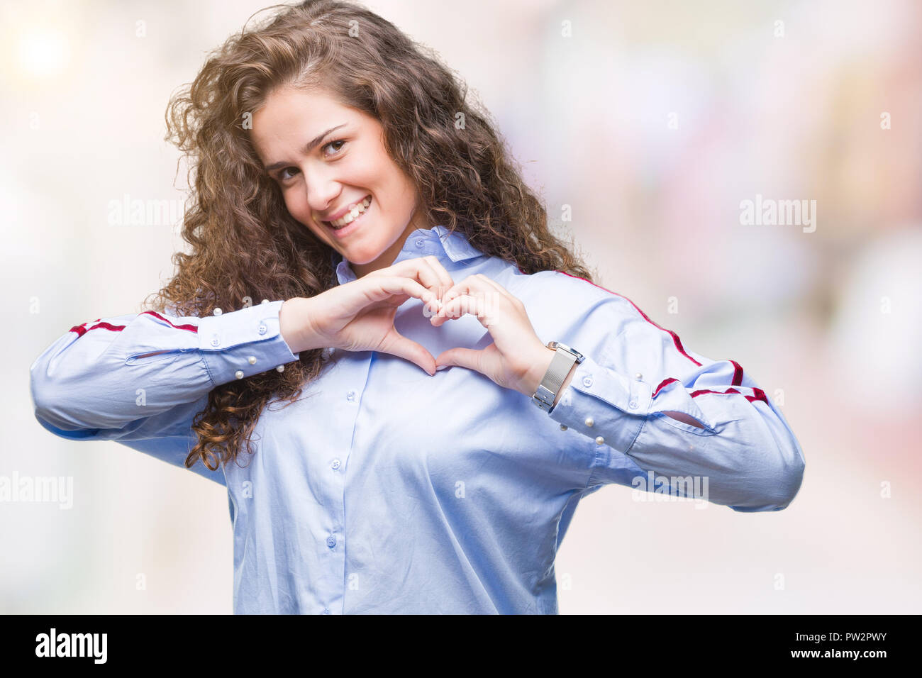 Beautiful brunette curly hair young girl wearing elgant look over ...