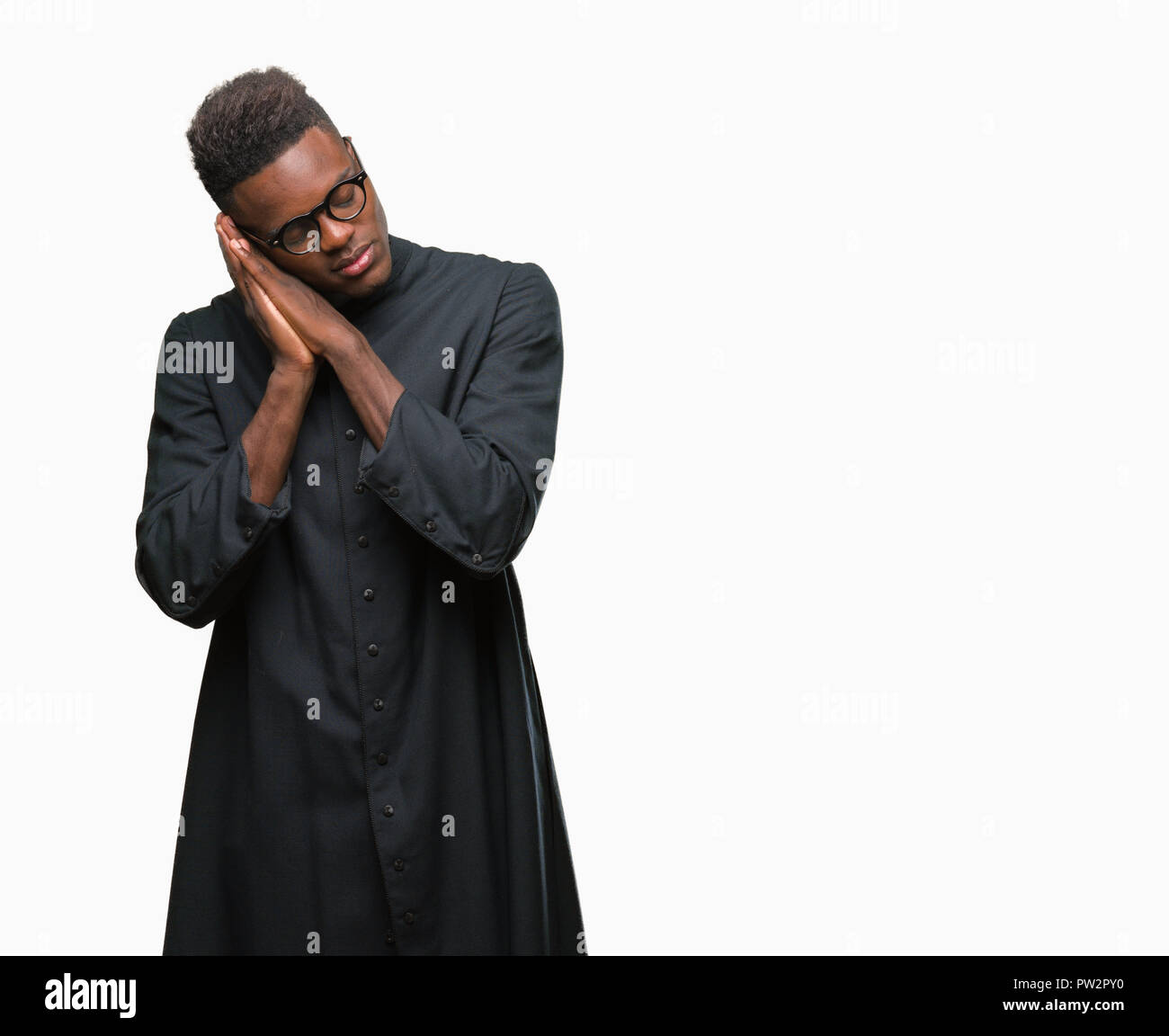 Young african american priest man over isolated background sleeping ...