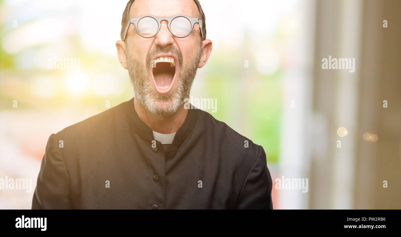 Clergyman priest sad hi-res stock photography and images - Alamy
