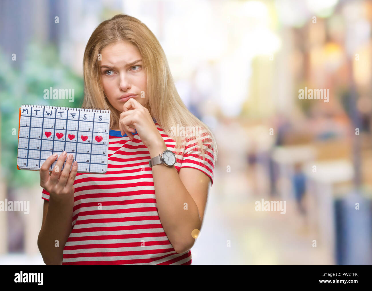 Woman and calendar and confused hi-res stock photography and images - Alamy