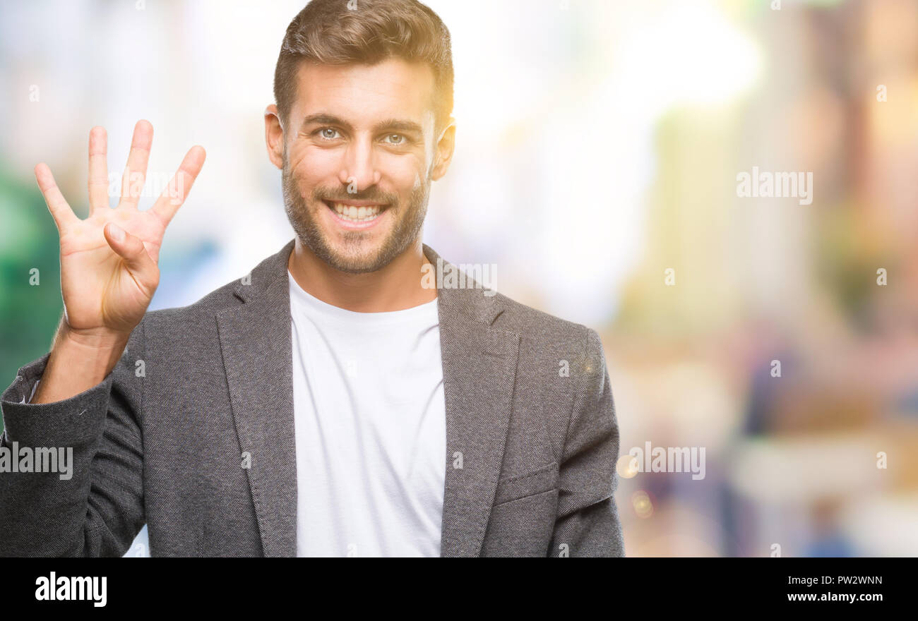 Young handsome business man over isolated background showing and ...