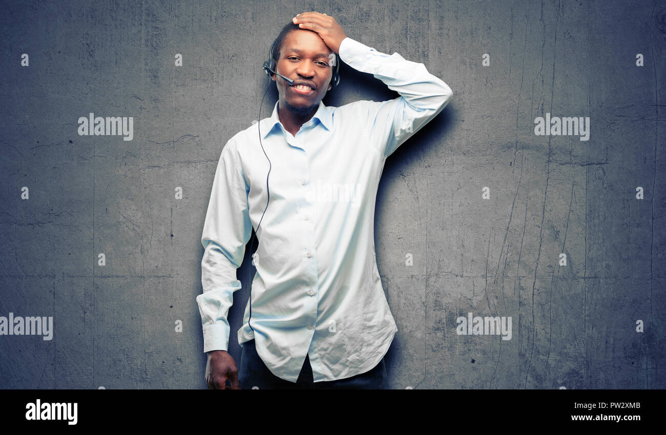 Black man consultant of call center terrified and nervous expressing ...