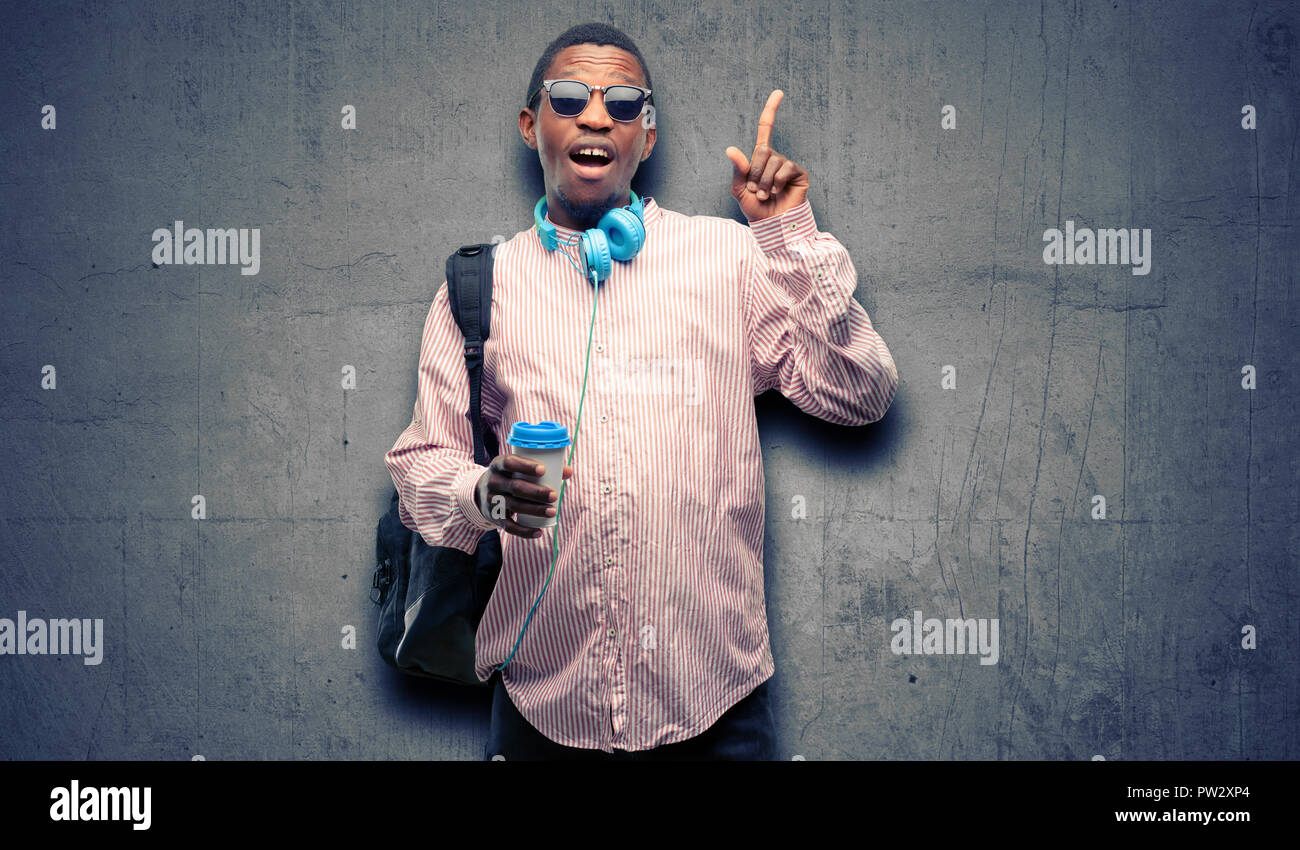 African black man student pointing away side with finger Stock Photo ...