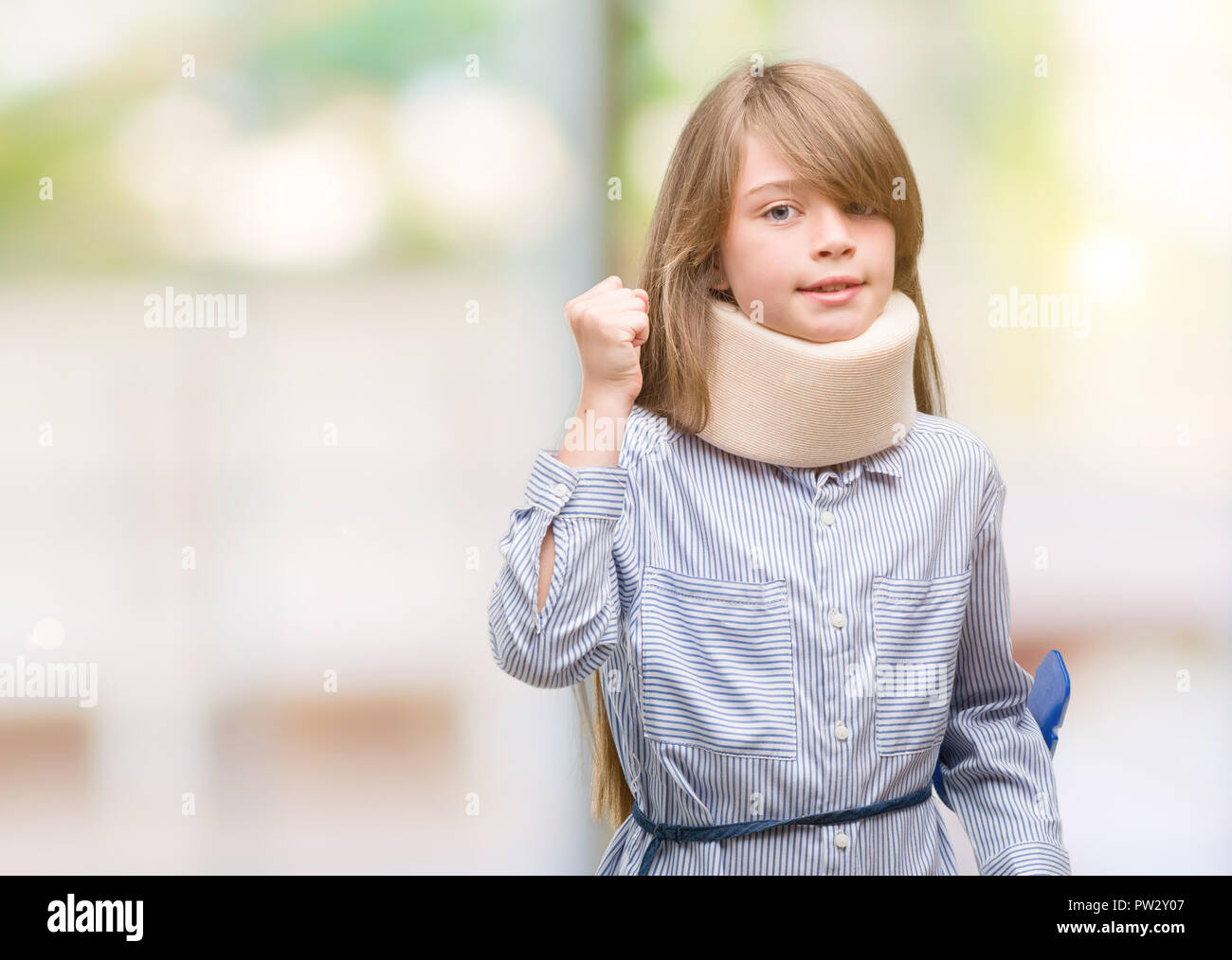 Young blonde child injured wearing neck collar and crutches screaming ...