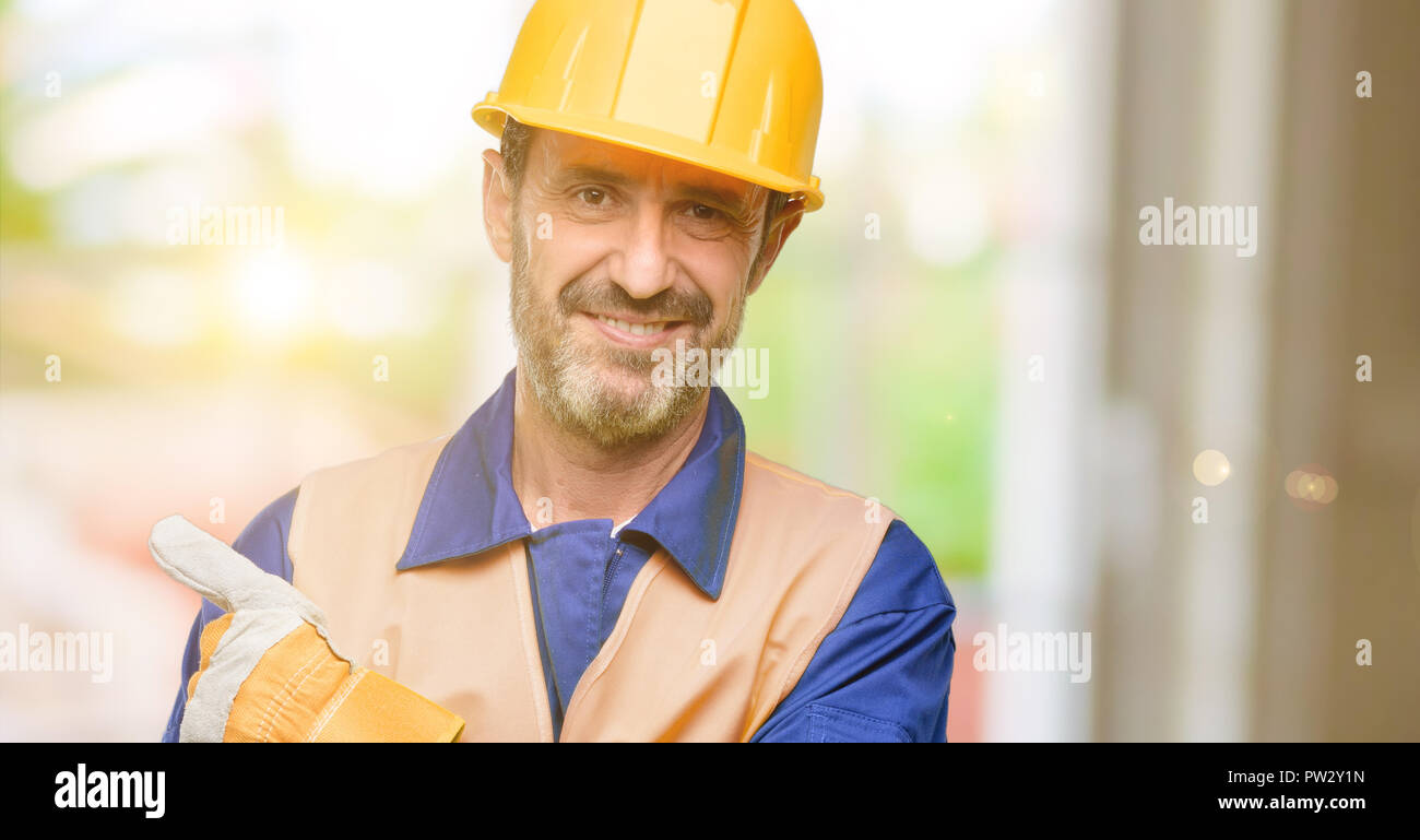 Senior engineer man, construction worker pointing away side with finger ...
