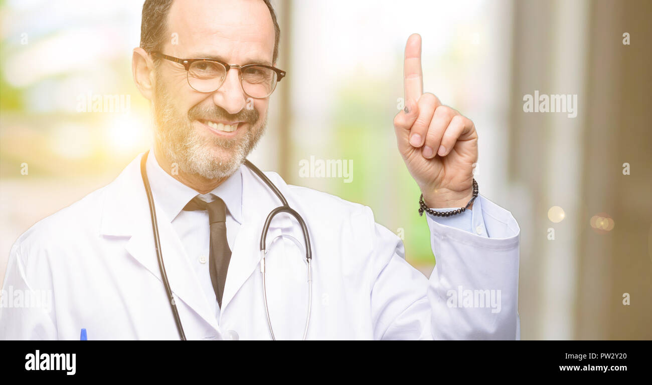 Nice professional doctor pointing hi-res stock photography and images ...