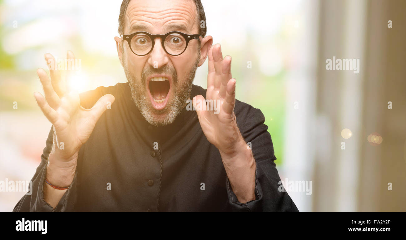 Priest religion man stressful keeping hands on head, terrified in panic ...