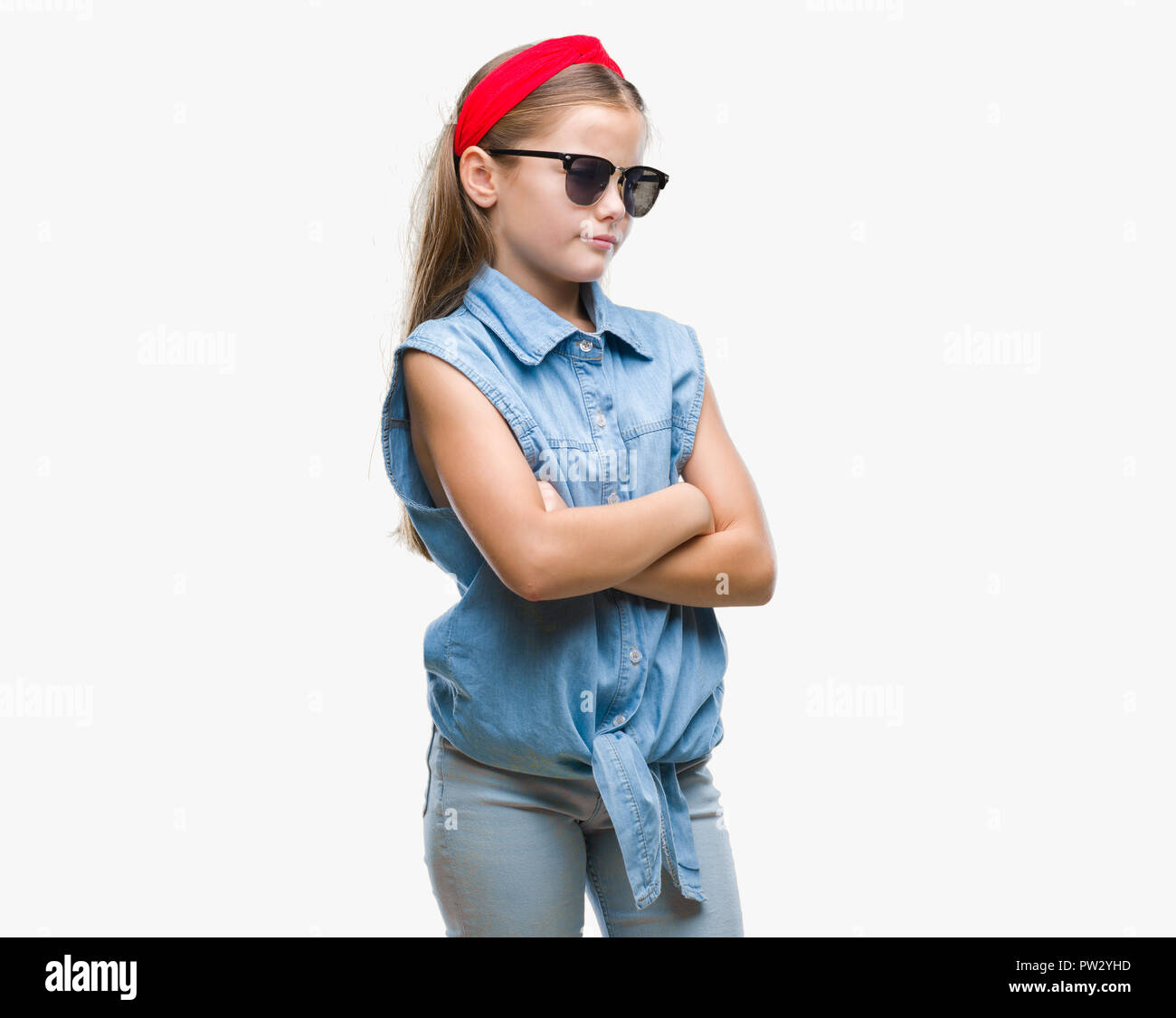 Young beautiful girl wearing sunglasses over isolated background ...