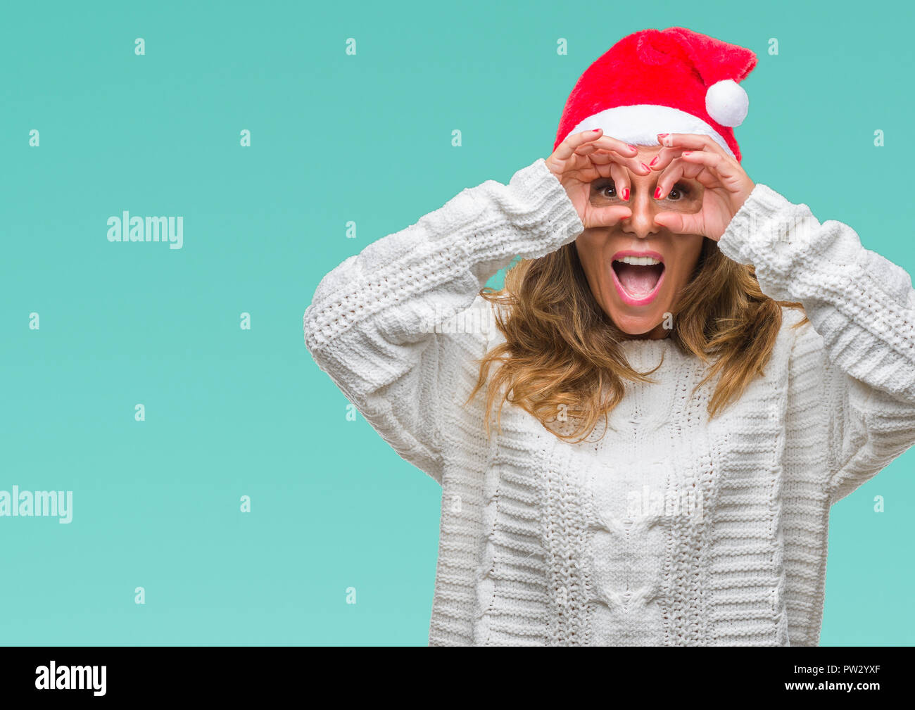 Middle Age Senior Hispanic Woman Wearing Christmas Hat Over Isolated Background Doing Ok Gesture