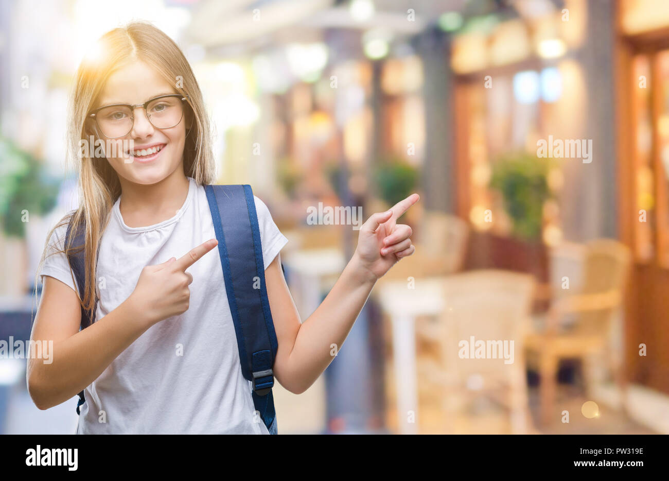 Young beautiful smart student girl wearing backpack over isolated ...