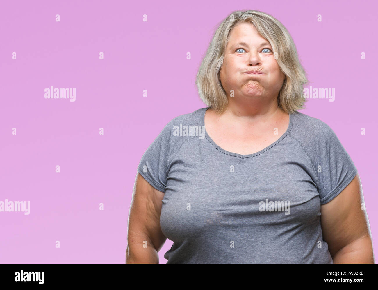 Puffing cheeks hi-res stock photography and images - Alamy