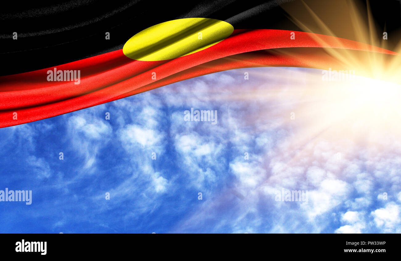 the flag of Australian Aboriginal in the rays of the summer sun, in the ...