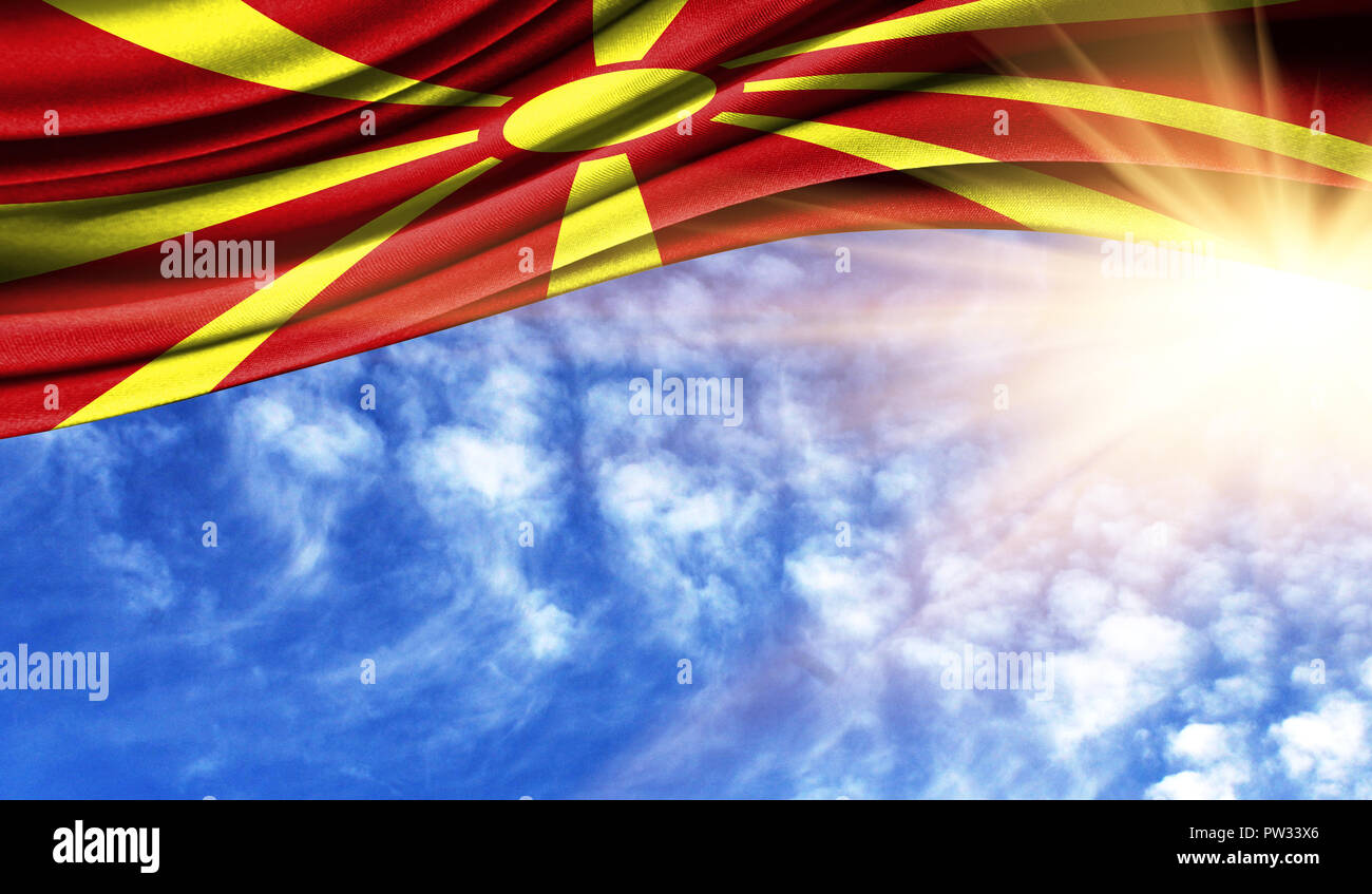 the flag of Macedonia in the rays of the summer sun, in the sky ...
