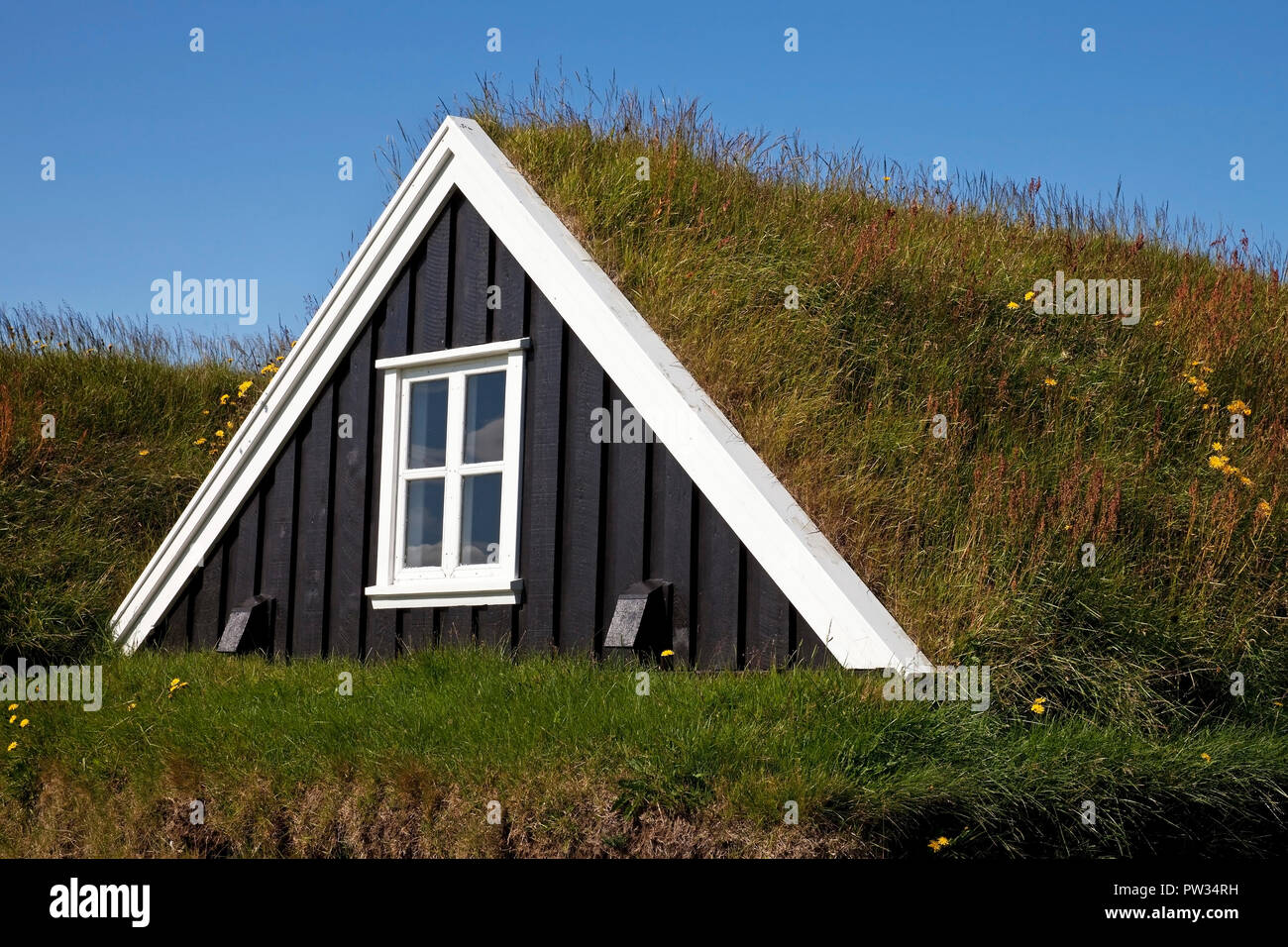 Traditional wooden house with grass roof, Museum Hellissandur ...