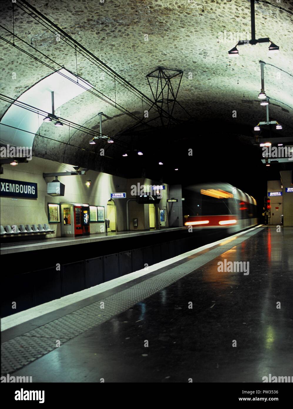 Long exposure capture depicting the Paris Metro at night Stock Photo ...
