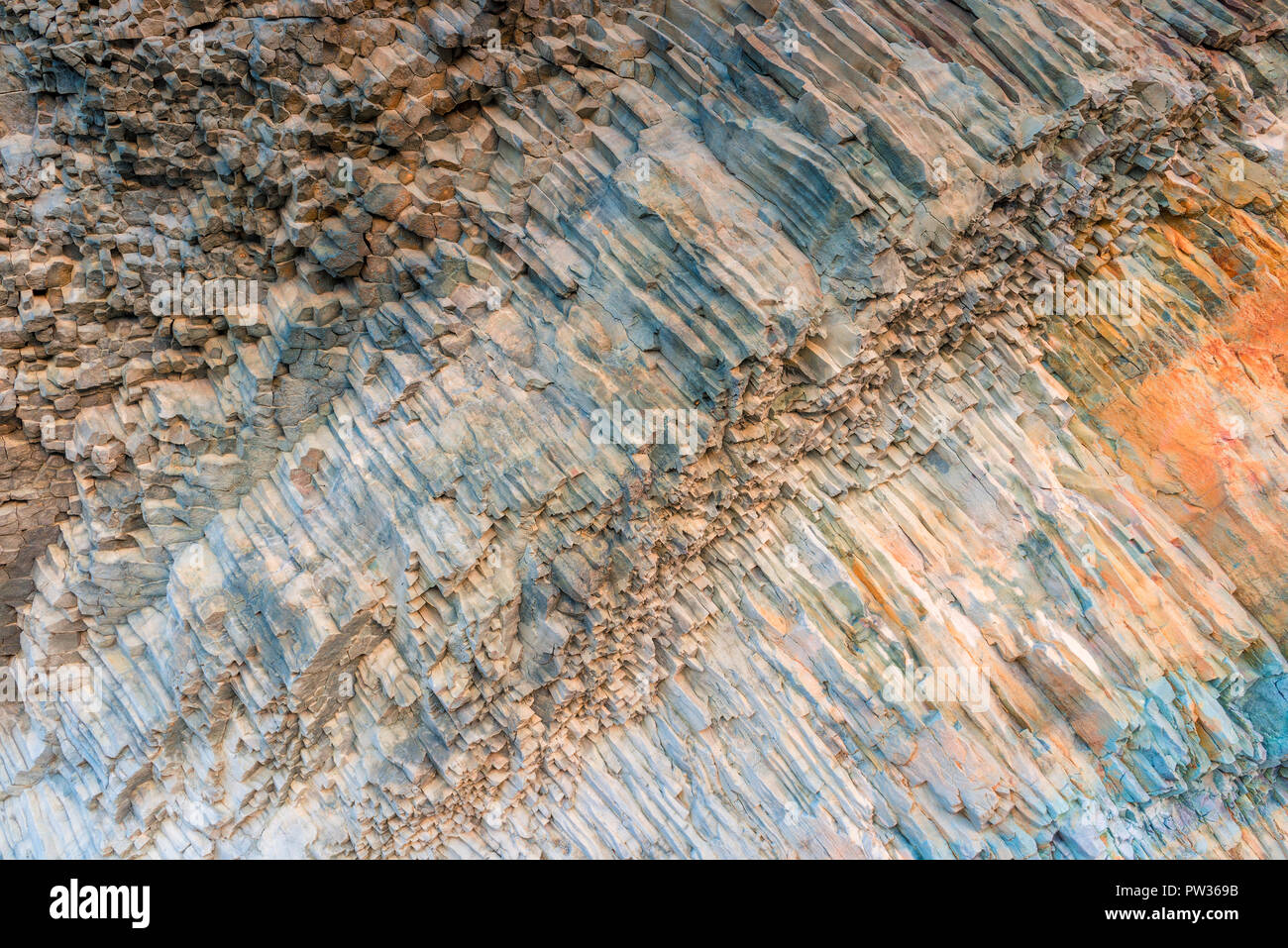 surface of rock rocks frozen lava in the form of hexagons close-up ...