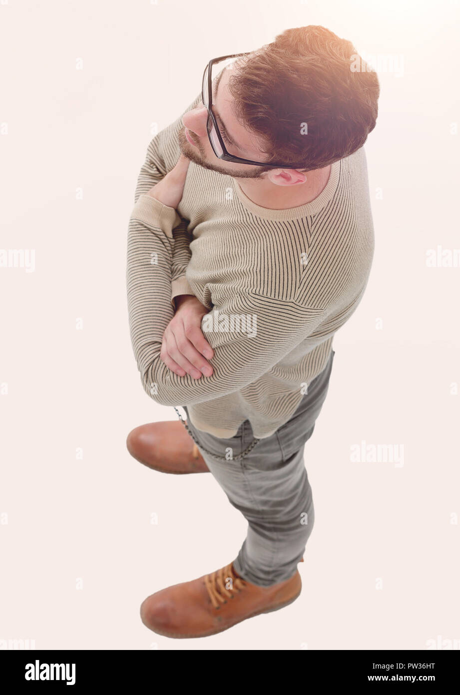 serious young man. Concept of perspective. a top view Stock Photo - Alamy