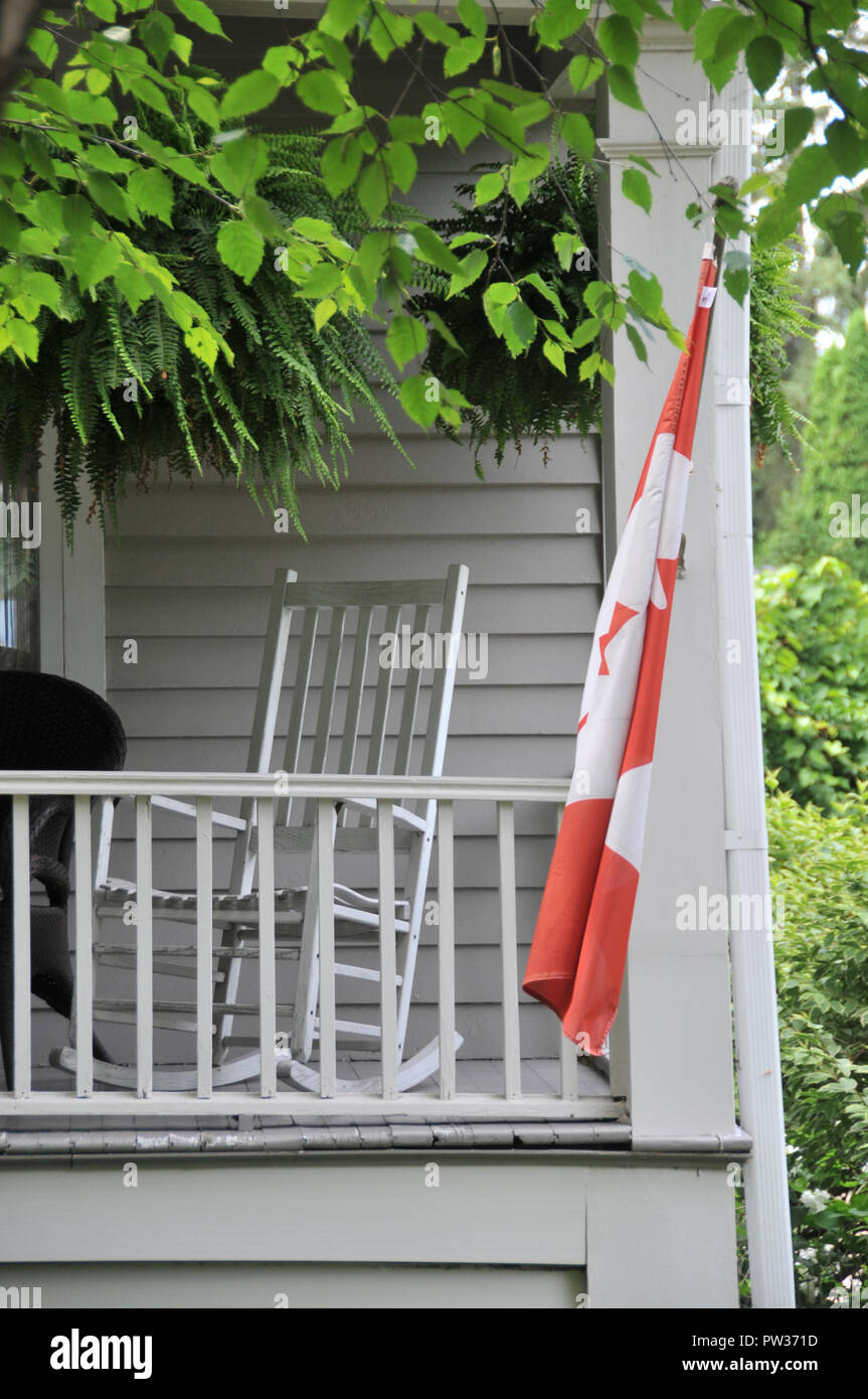 Around Canada - A Rocking Chair on an outdoor deck adorned with the ...
