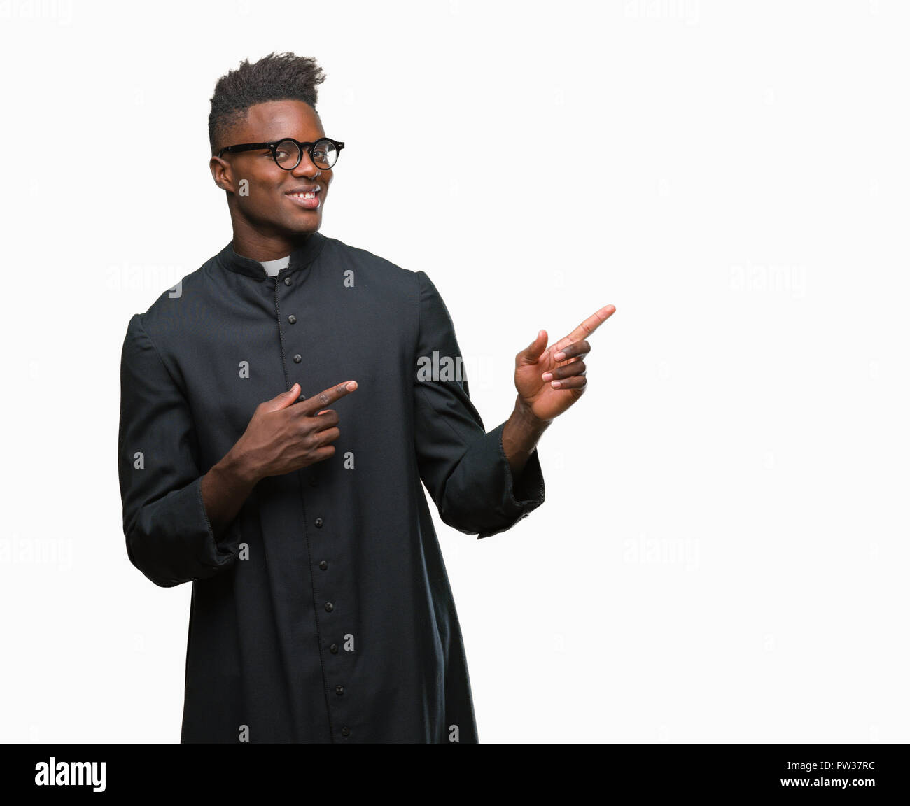 Portrait black young priest pointing hi-res stock photography and ...