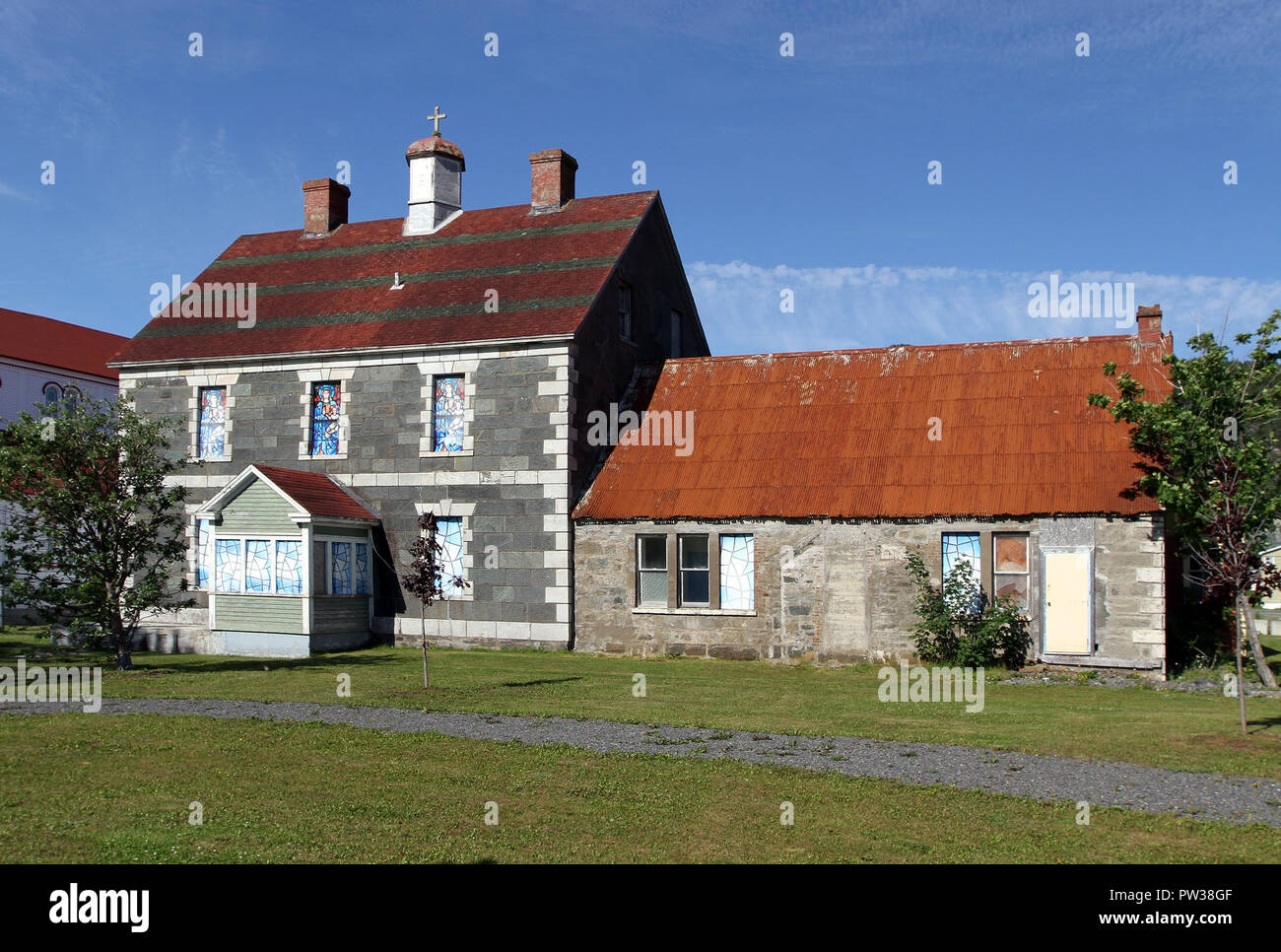 historic rustic stone church with red roof Stock Photo - Alamy