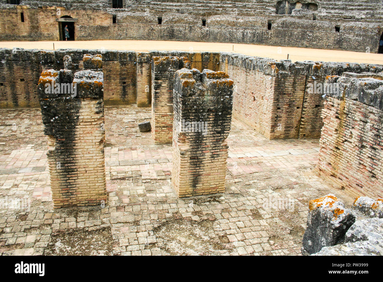 The ruins of the Roman amphitheatre at Italica, an ancient city in ...
