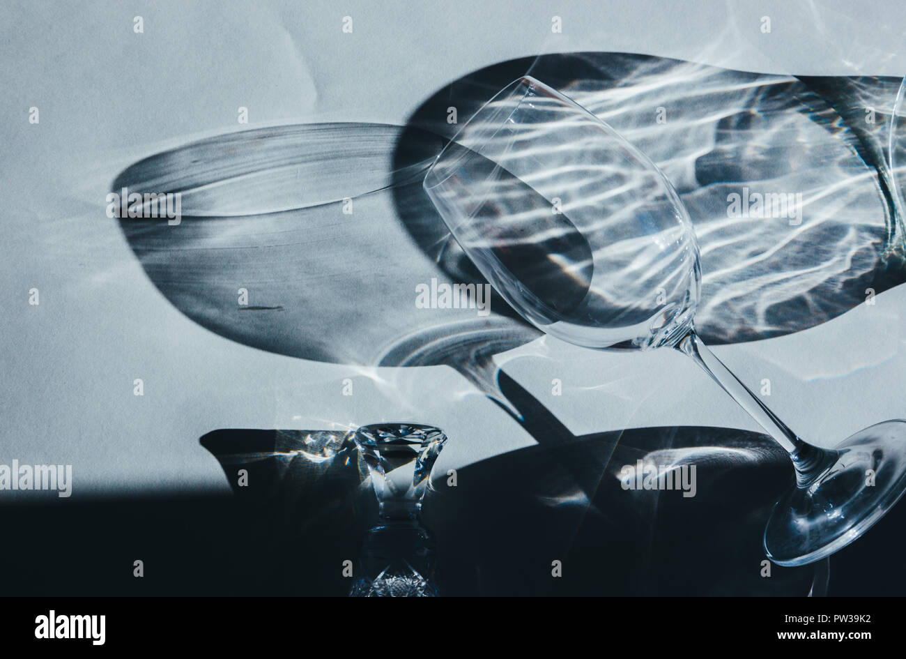 Glass goblets cast beautiful shadow and beautiful caustic effect as ...