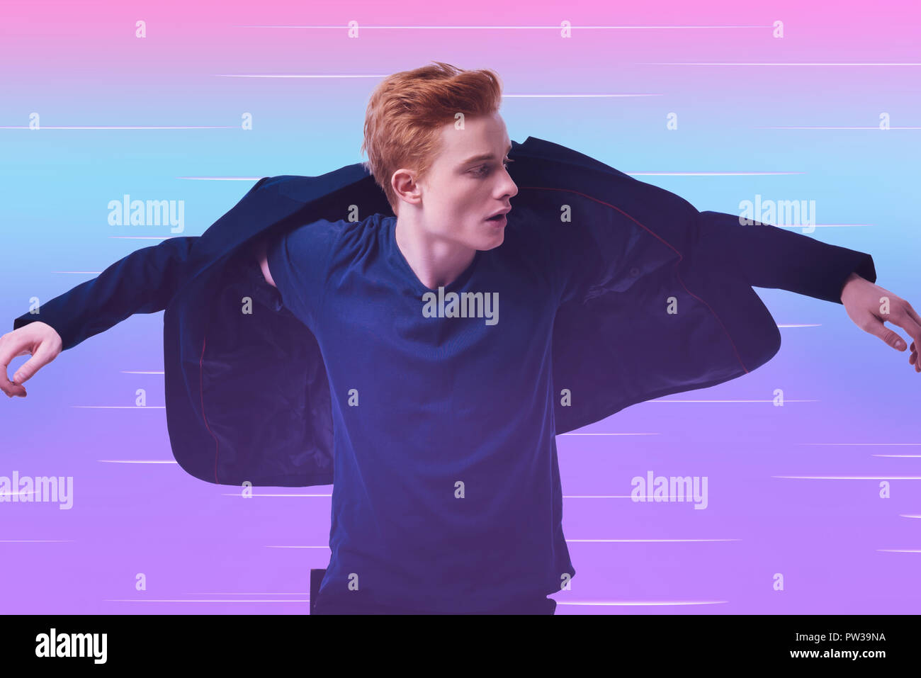 Putting on jacket hi-res stock photography and images - Alamy