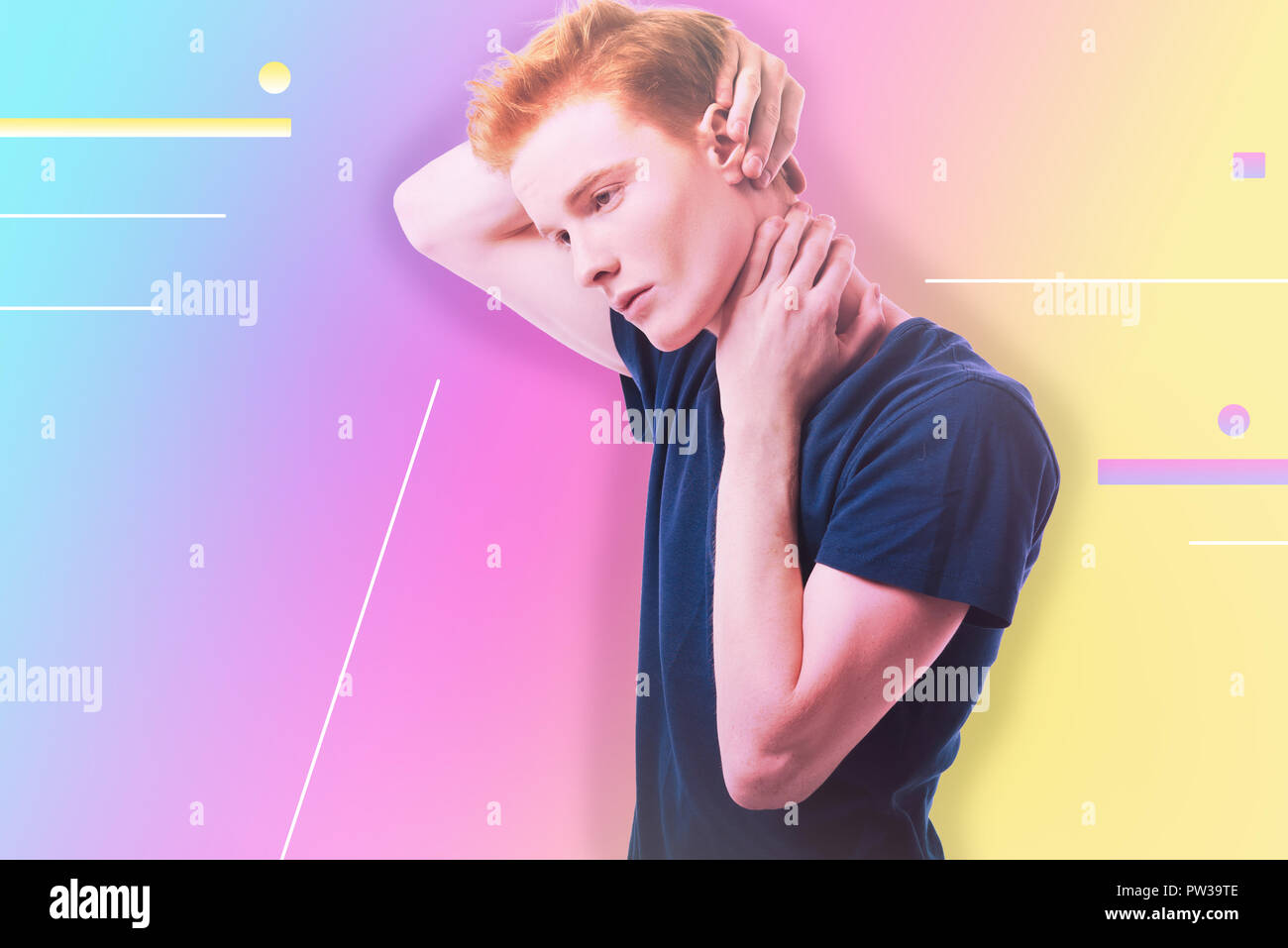 Serious student having pain in his neck after studying Stock Photo - Alamy