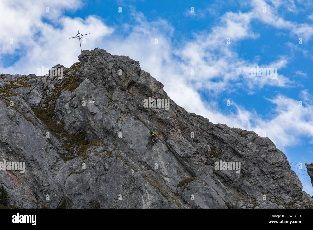 Climbing on mount Brunni at Engelberg in the Swiss alps in summer Stock ...
