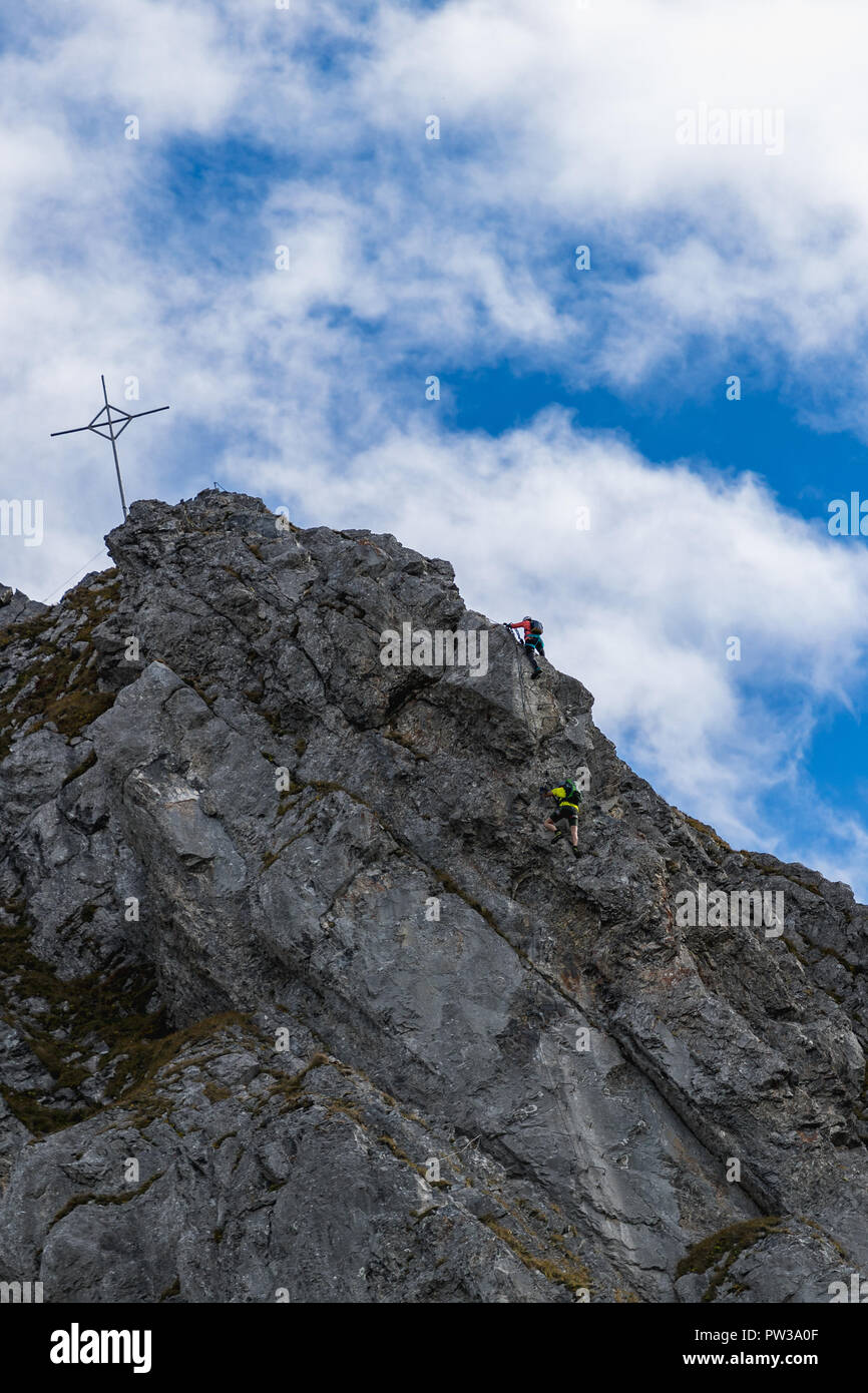 Climbing on mount Brunni at Engelberg in the Swiss alps in summer Stock ...