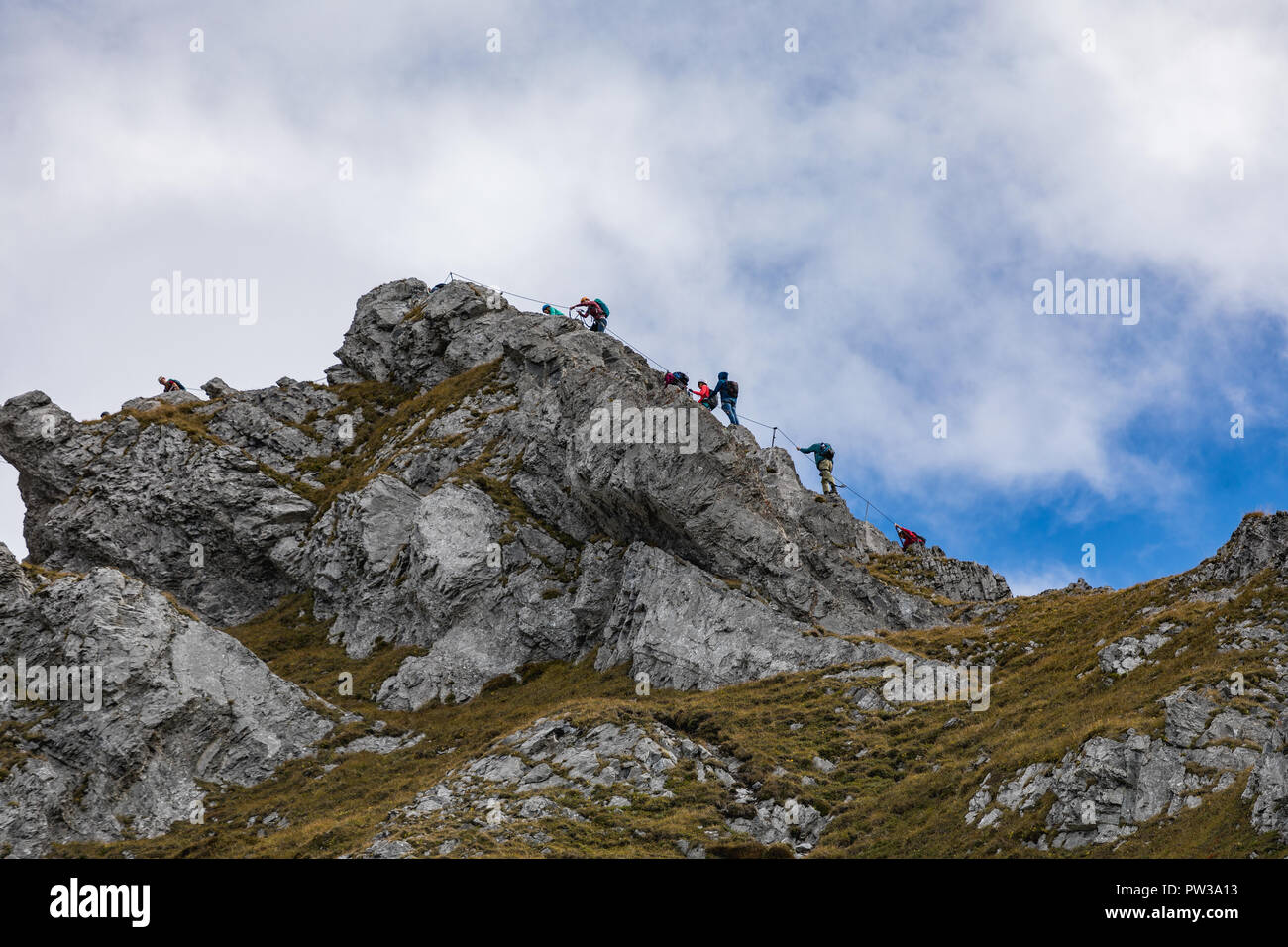 Climbing on mount Brunni at Engelberg in the Swiss alps in summer Stock ...