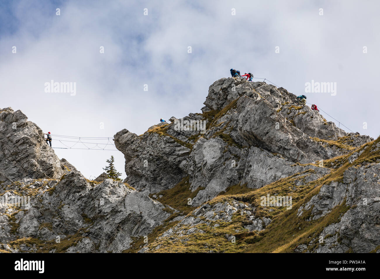 Climbing on mount Brunni at Engelberg in the Swiss alps in summer Stock ...
