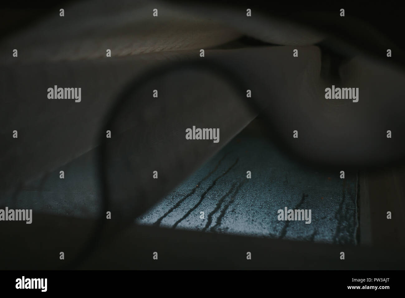 low angle picture of a window with condensation water running down ...