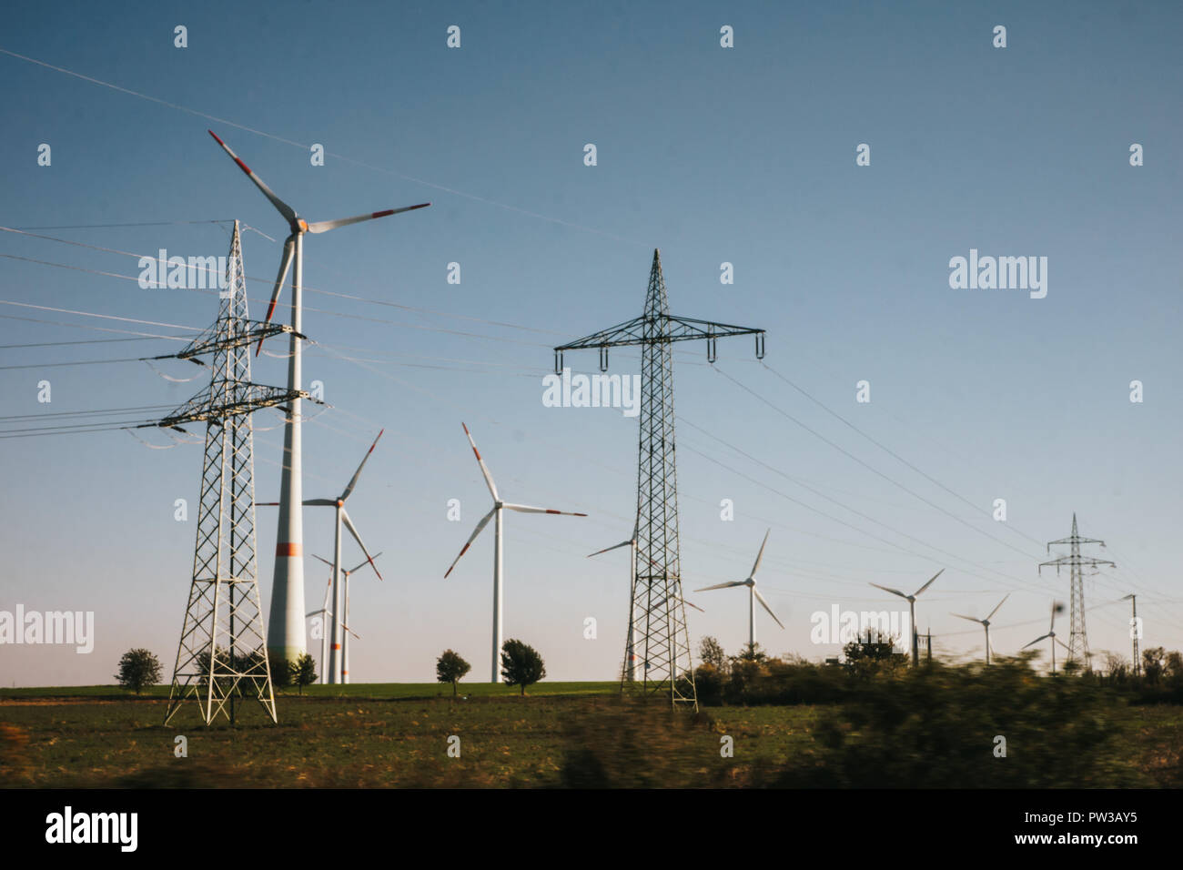 Power transmission tower wind turbines hi-res stock photography and ...