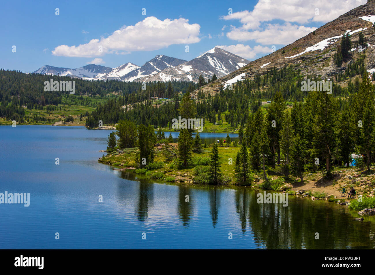 Views of Tioga Lake, an alpine lake in Yosemite National Park ...