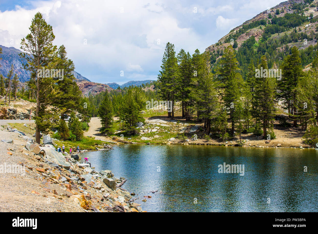 Views of Tioga Lake, an alpine lake in Yosemite National Park ...