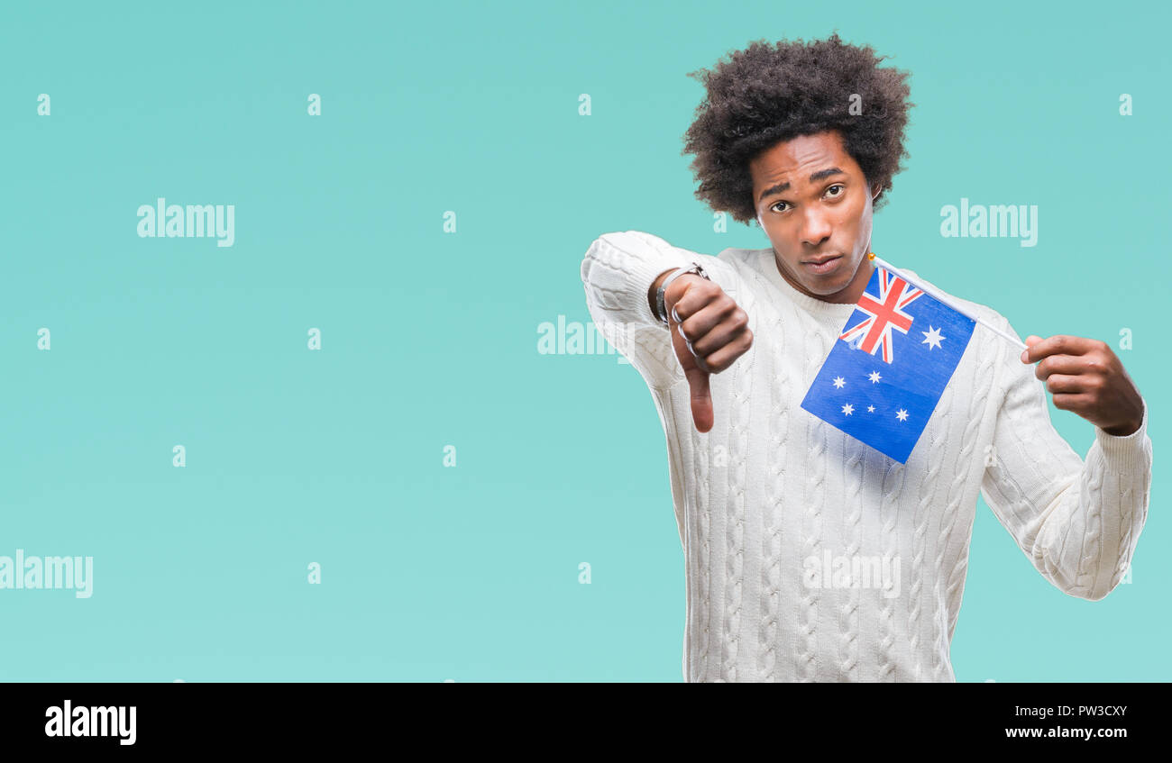 Afro american man flag of Australia over isolated background with angry ...