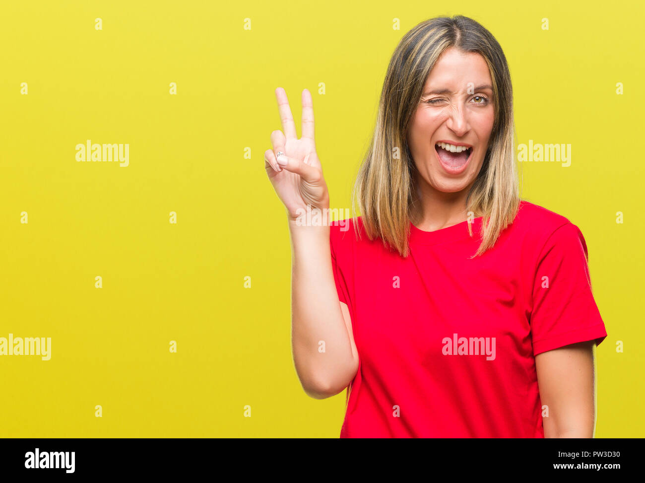 Hispanic beautiful woman winking face hi-res stock photography and ...
