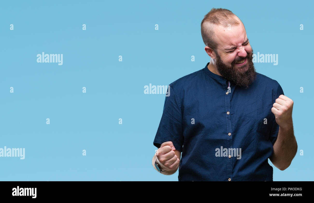 Young caucasian hipster man over isolated background very happy and ...