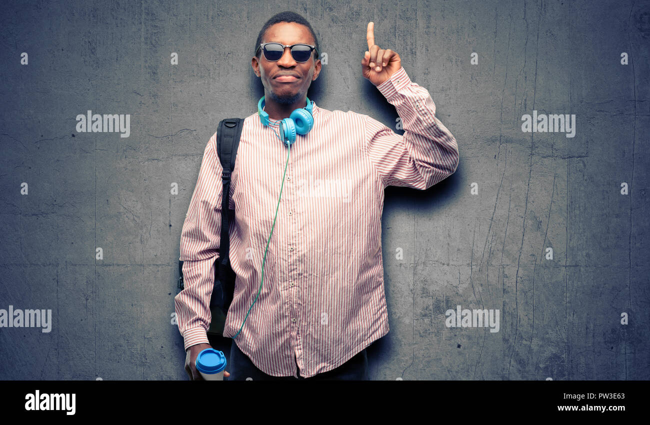 African black man student raising finger, the number one Stock Photo ...