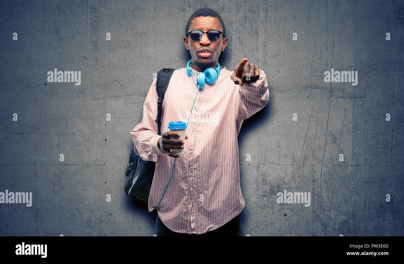 African black man student pointing to the front with finger Stock Photo ...