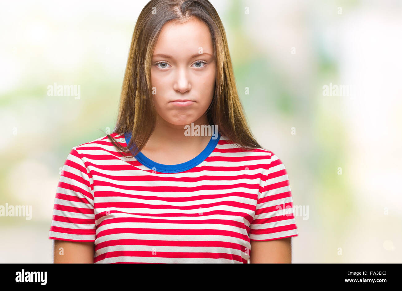 Young caucasian beautiful woman over isolated background depressed and ...