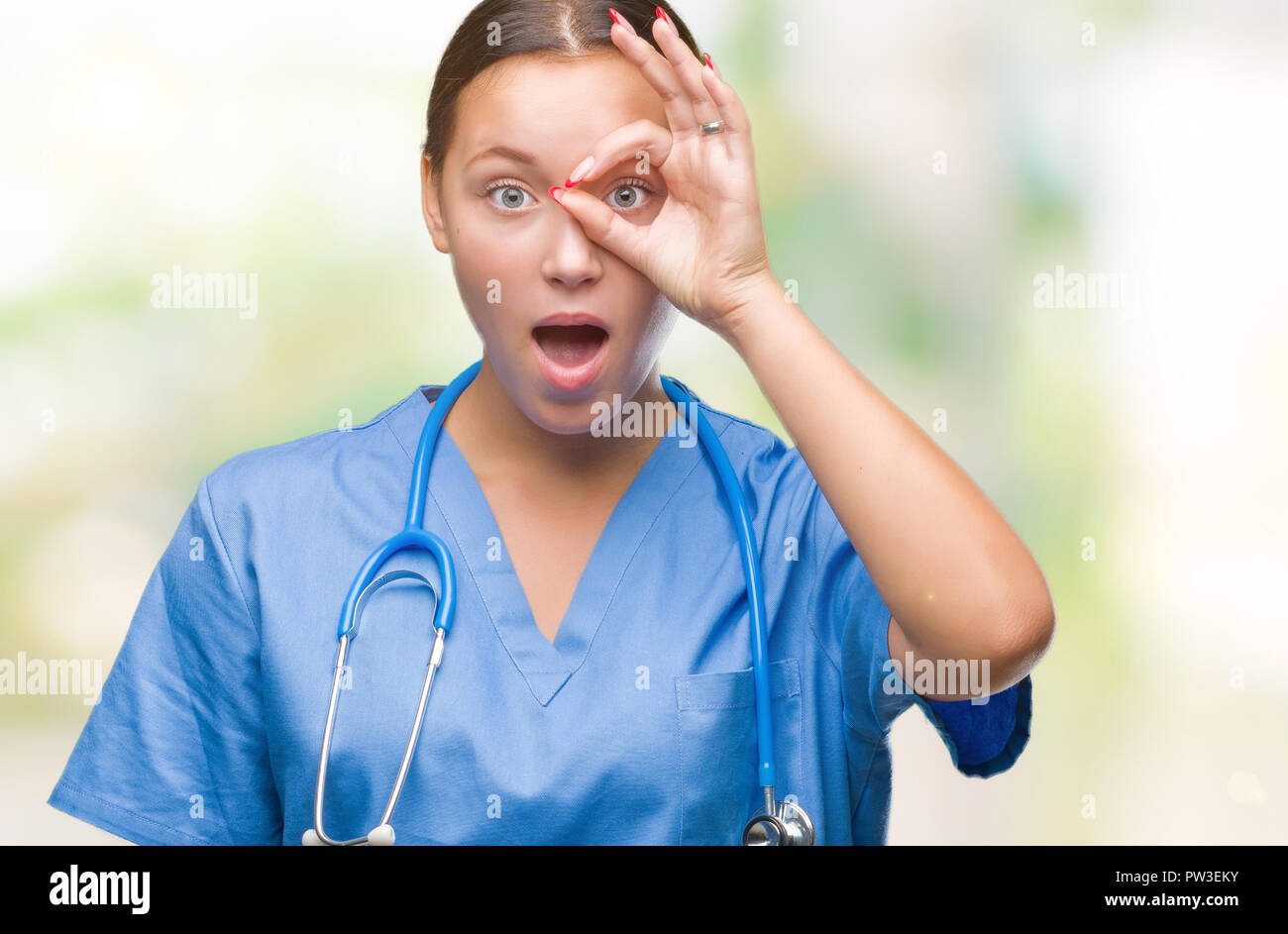 Young caucasian doctor woman wearing medical uniform over isolated ...