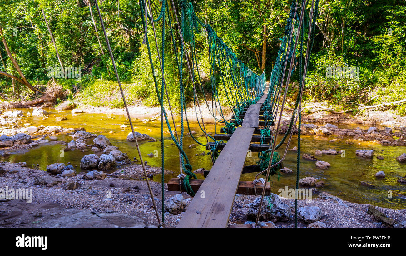 Suspension bridge made with wood and ropes Stock Photo - Alamy